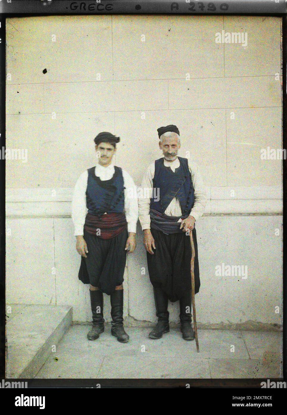 Athens, Greece two peasants (the father and the son) of the crest ...