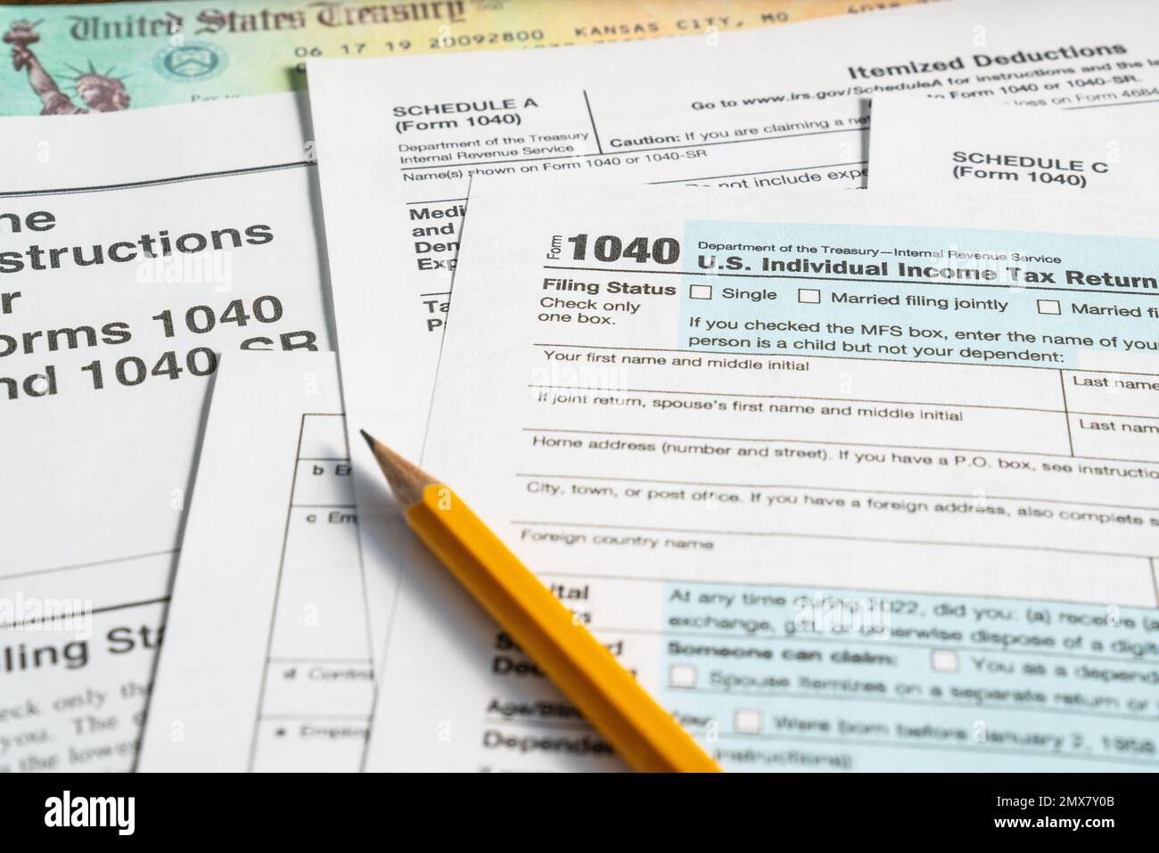 IRS Federal Tax Forms in preparation for preparing taxes Stock Photo ...