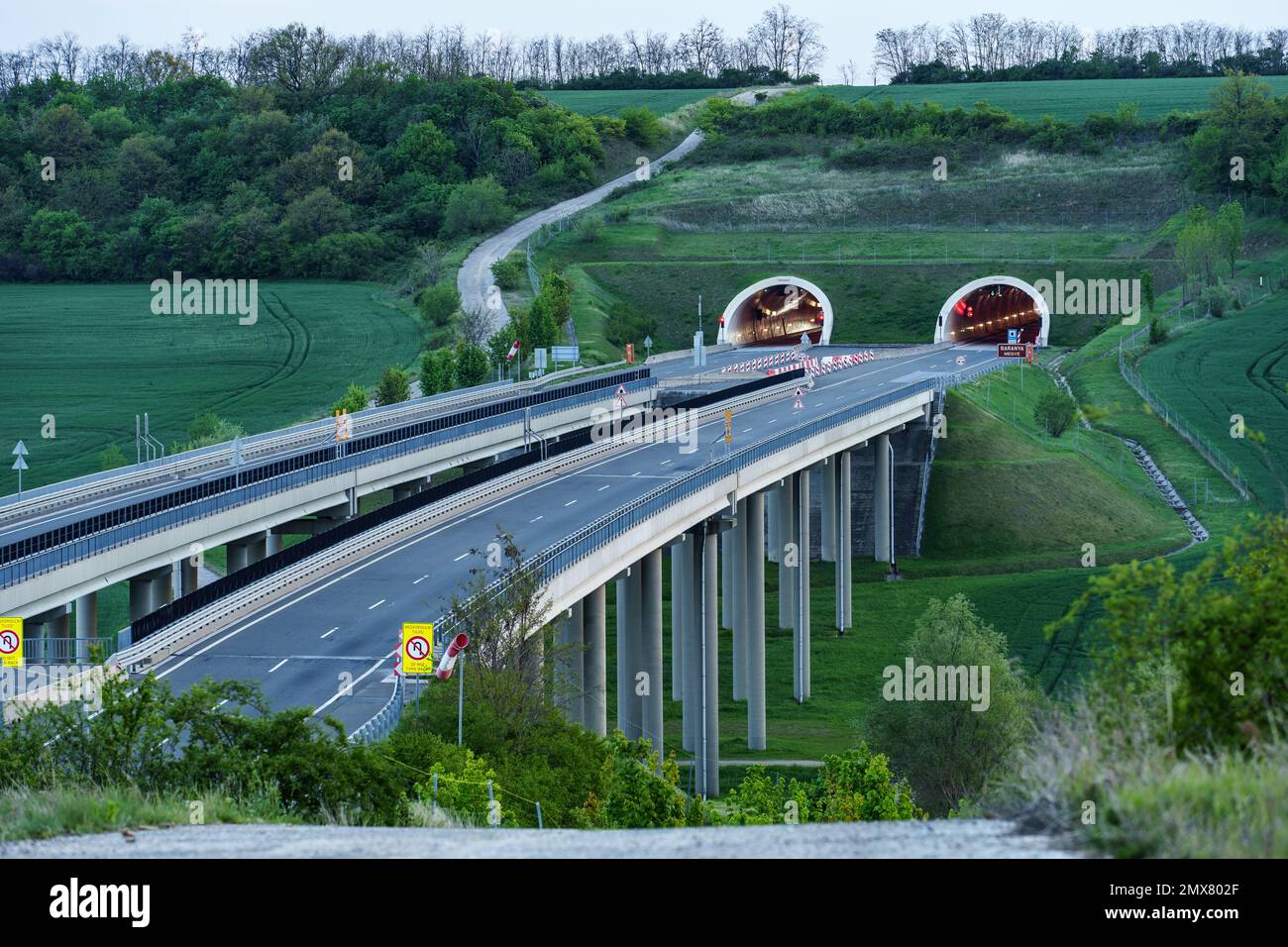 Hungarian M6 highway with tunel at evening Stock Photo - Alamy