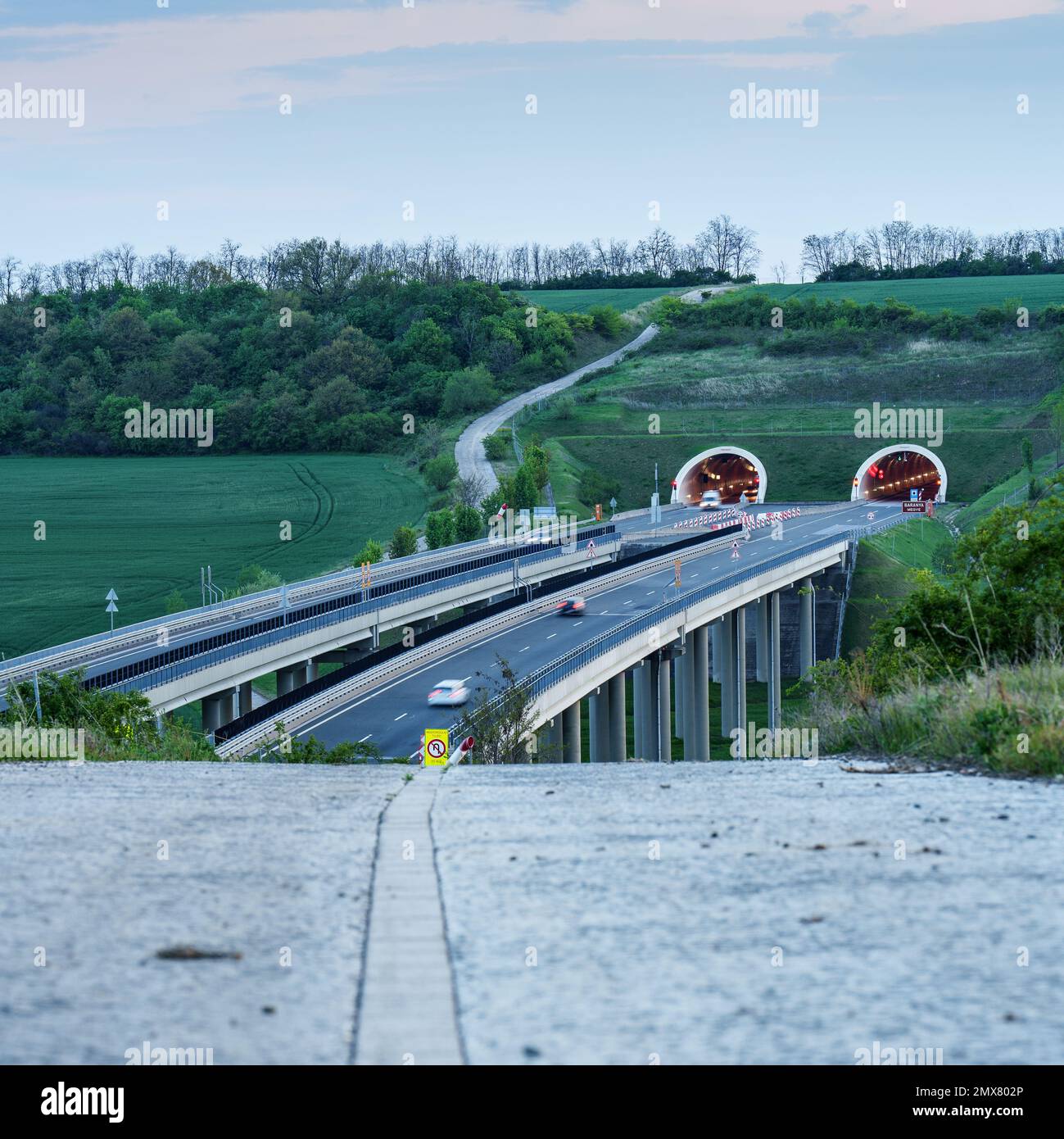 Hungarian M6 highway with tunel at evening Stock Photo - Alamy