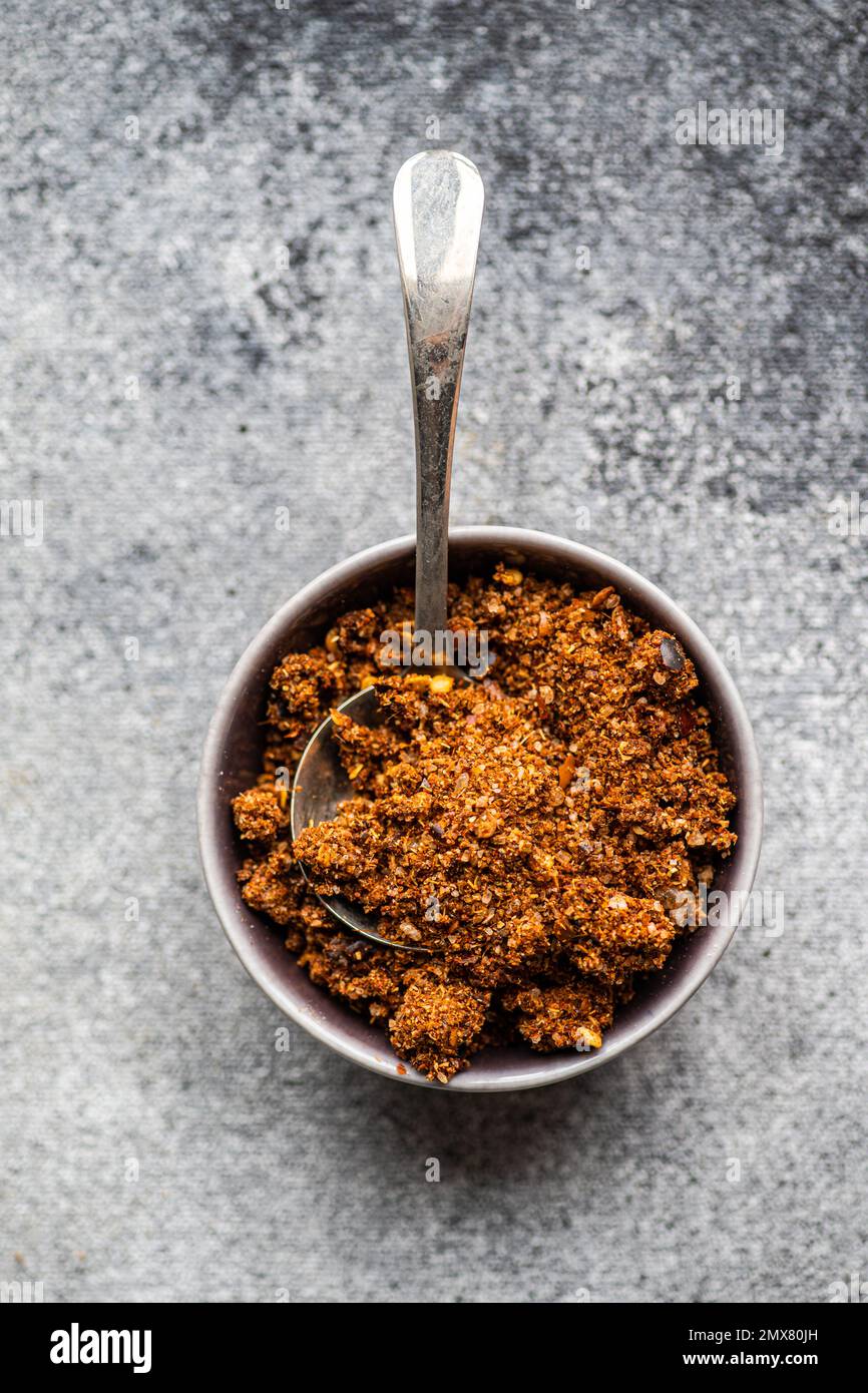 Top view Georgian spice mix known as a Dry Megrelian Adjika in the bowl ...