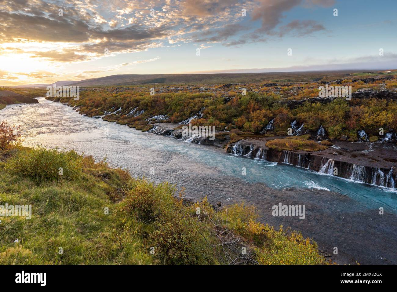 From above spectacular scenery of massive rapid waterfall flowing into ...