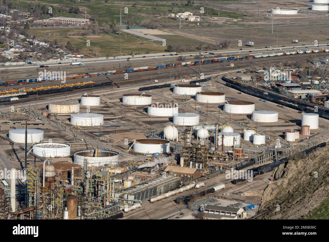 An oil refinery and oil storage tanks near Salt Lake City, Utah. Behind ...