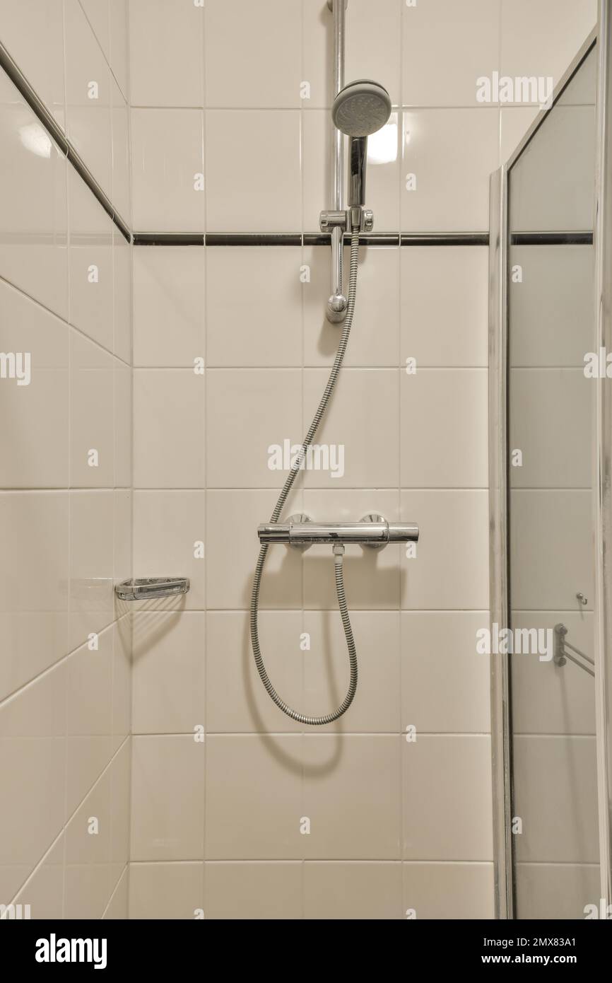 Interior of a modern shower with white walls Stock Photo - Alamy
