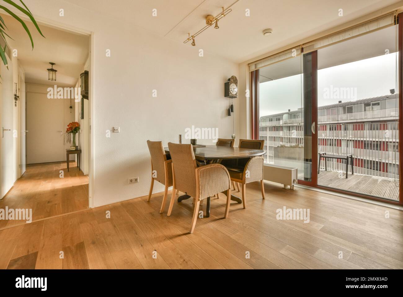 Dining table with chairs in spacious light dining room with panoramic ...