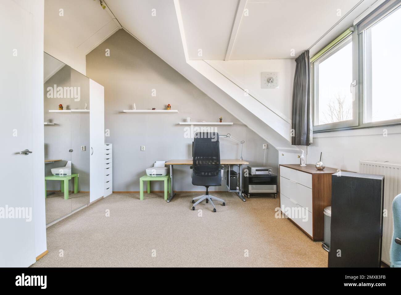 Contemporary interior design of spacious workplace with desk and chair ...