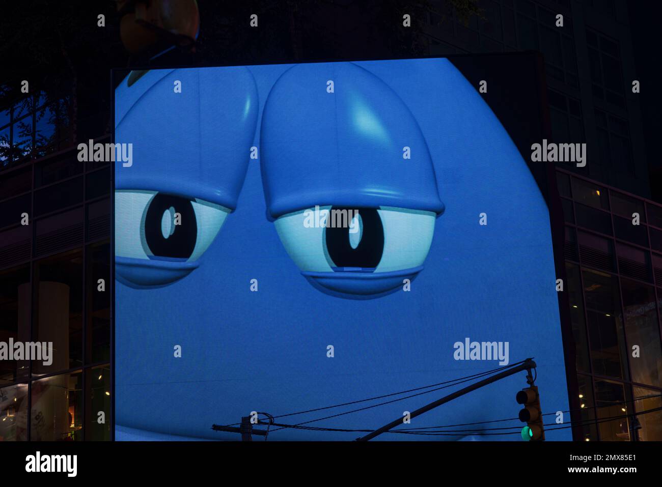 View of big blue mm candy image on outdoor led display board in ...