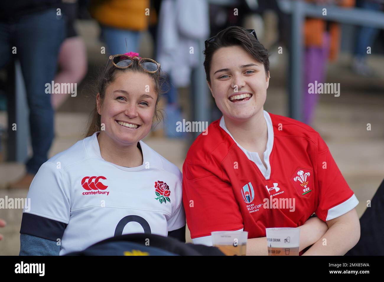 English and Welsh female rugby supporters at Kingsholm Stock Photo - Alamy