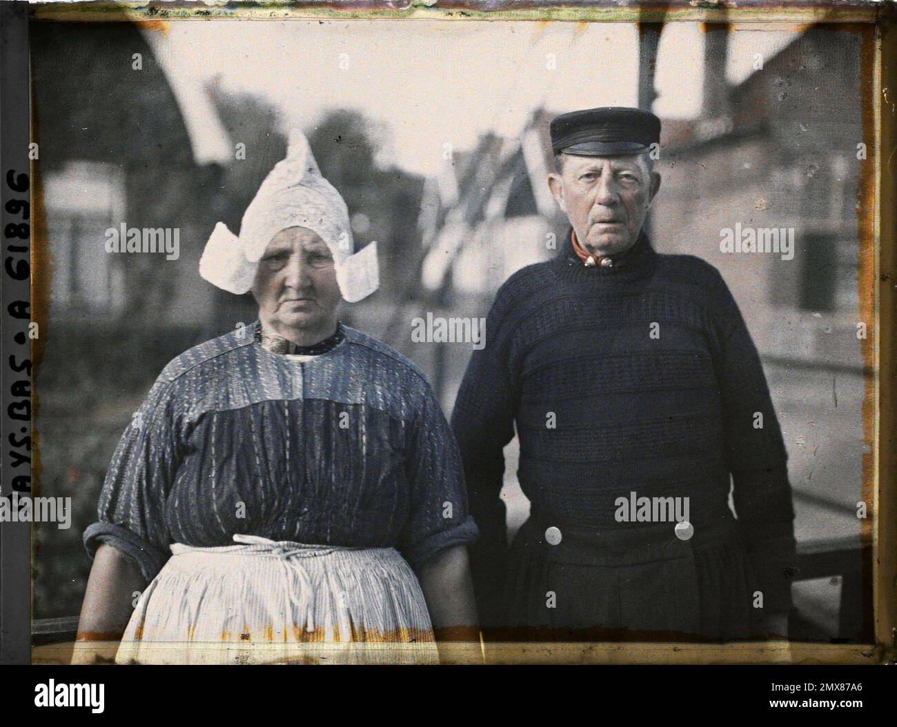 Steendam, Netherlands A fisherman and his wife wearing the traditional ...