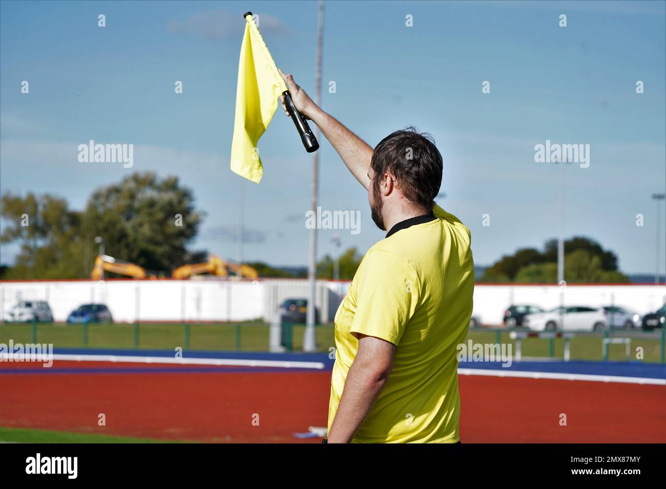 FA Wales assistant referee with flag Stock Photo - Alamy