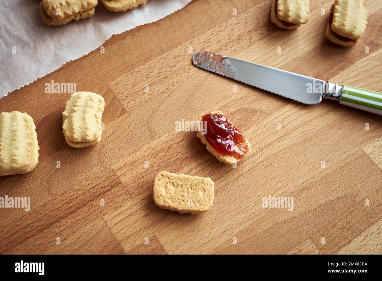 Preparation of traditional Christmas cookies - filling with strawberry ...