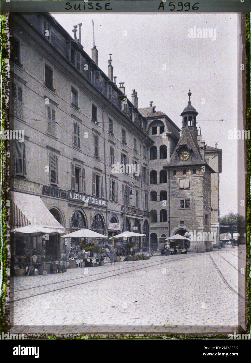 Geneva, Switzerland The Molard Tower and the Flower Market in Place du ...