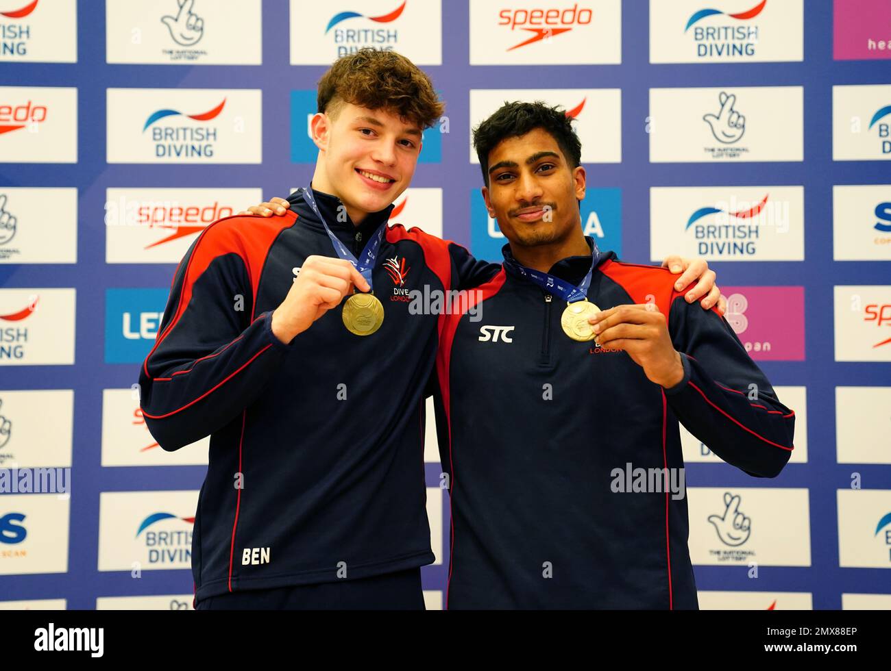 Ben Cutmore (left) and Kyle Kothari celebrate with their medals gold ...