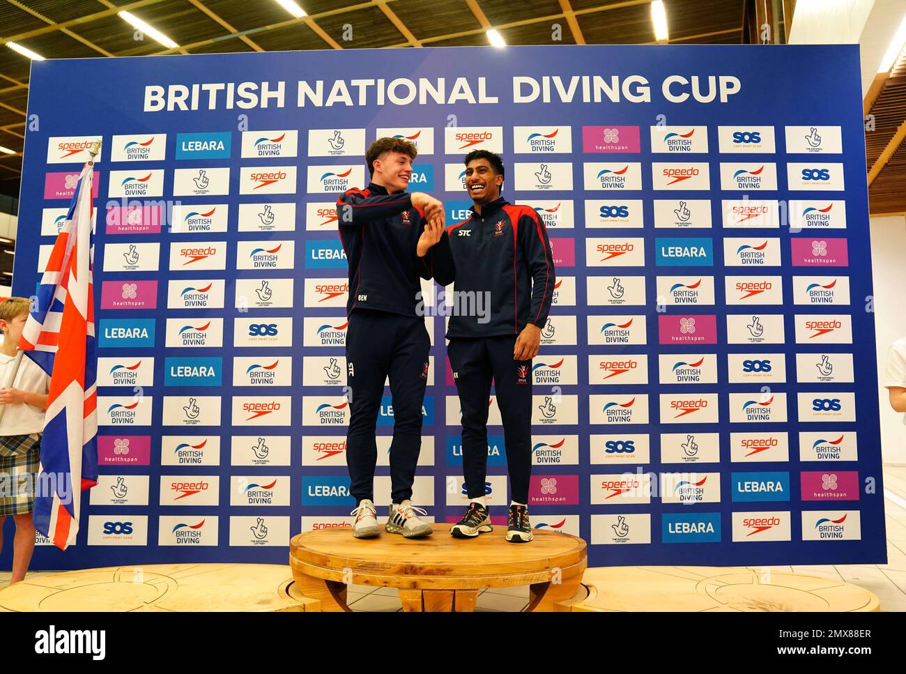 Ben Cutmore (left) and Kyle Kothari celebrate on the podium after ...
