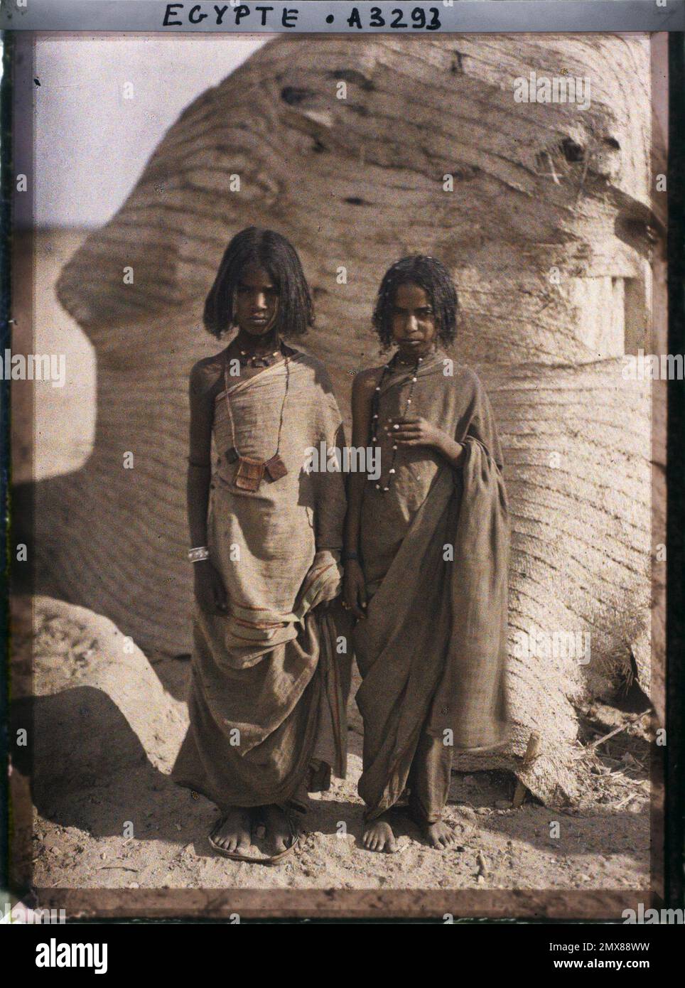 ASSOUAN, Egypt, Africa Two little girls bishari pose for the operator ...