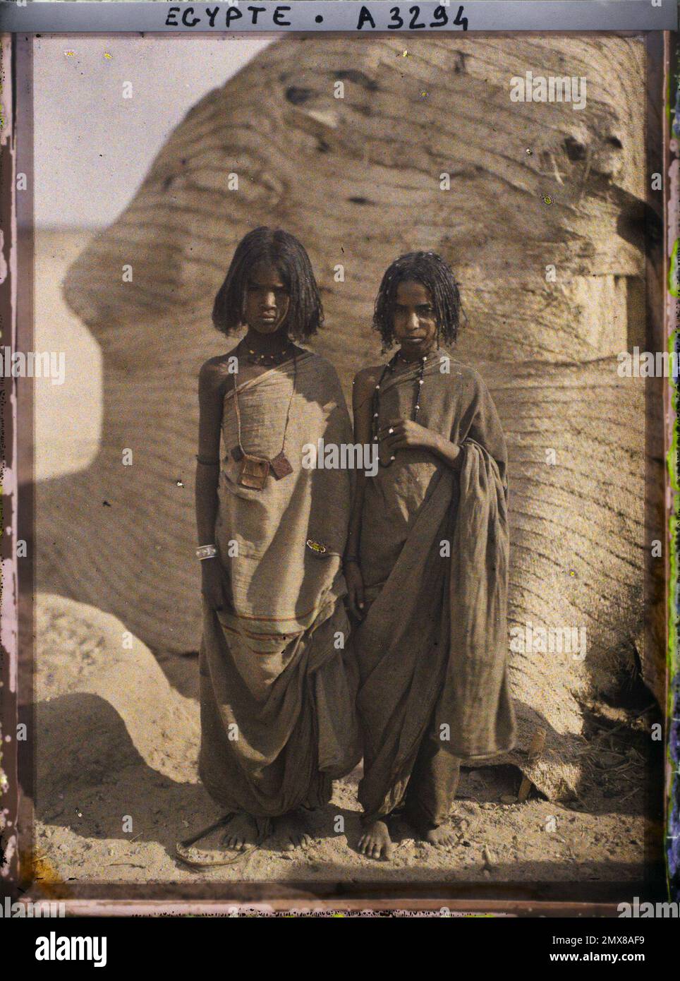 ASSOUAN, Egypt, Africa Two little girls bishari pose for the operator ...