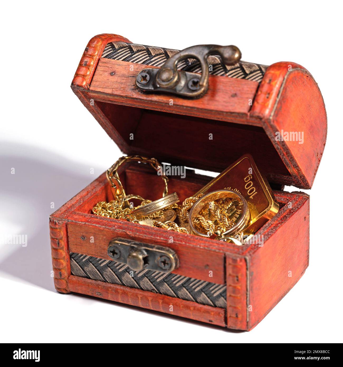 Wooden chest with gold jewelry against white background Stock Photo - Alamy