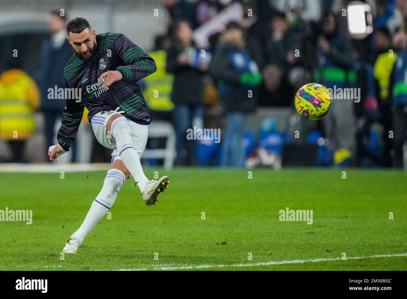 Real Madrid's Karim Benzema shoots the ball during a warm up session ...