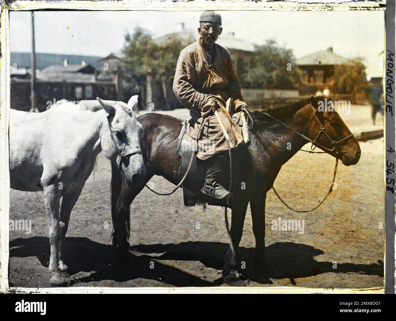 Troïtskosavsk, Transbaïkalie A Buriet Cavalier (?) Helding a horse by ...