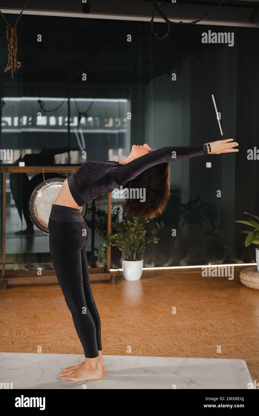 Standing deflection asana hi-res stock photography and images - Alamy