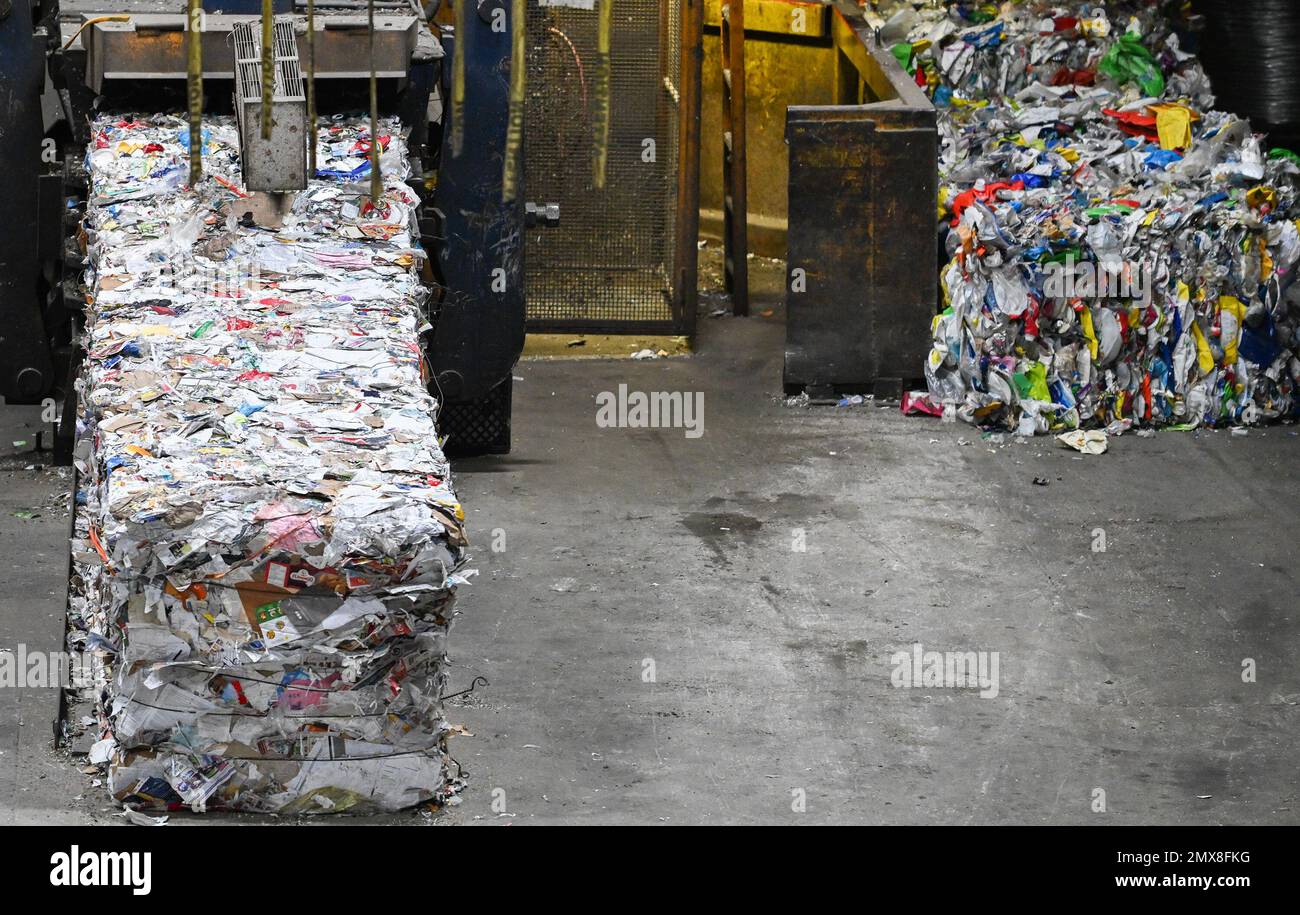 A stack of recyclable materials is shown at a Ricova recycling facility ...