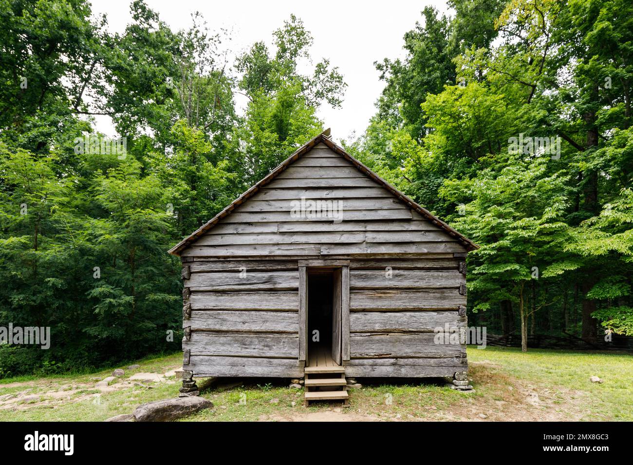 Front view of a historic log cabin along Roaring Fork Motor Nature ...