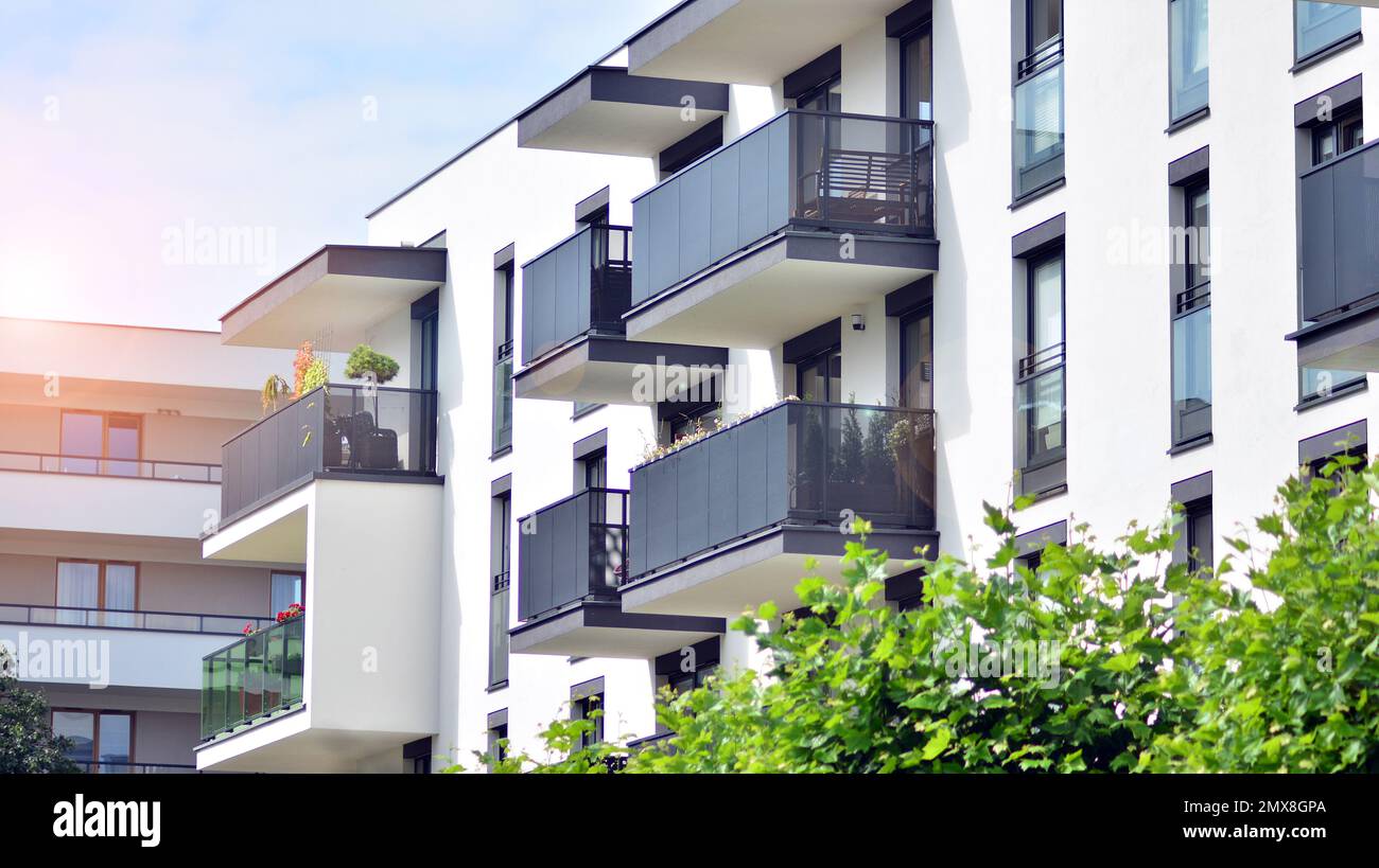 Modern residential building with new apartments in a green residential ...