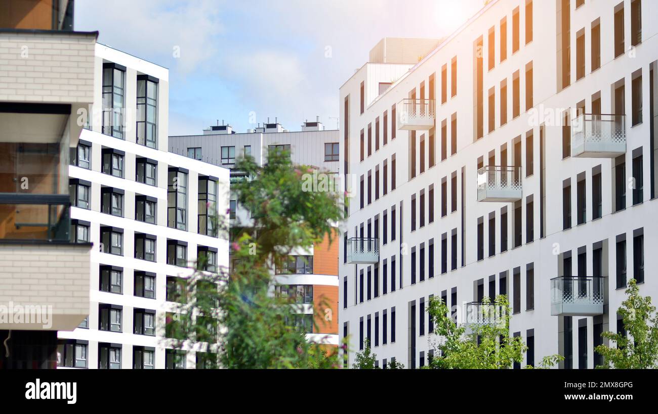 Modern residential building with new apartments in a green residential ...