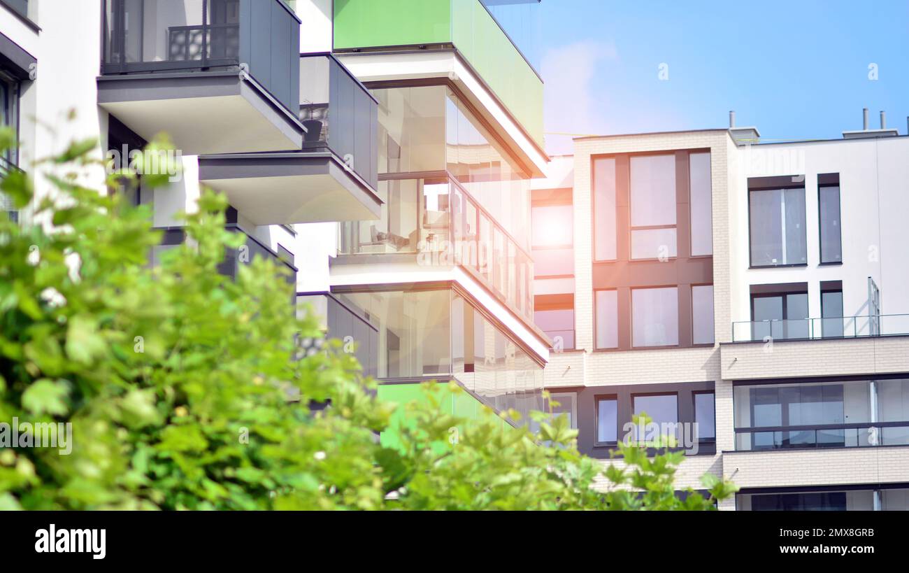 Modern residential building with new apartments in a green residential ...