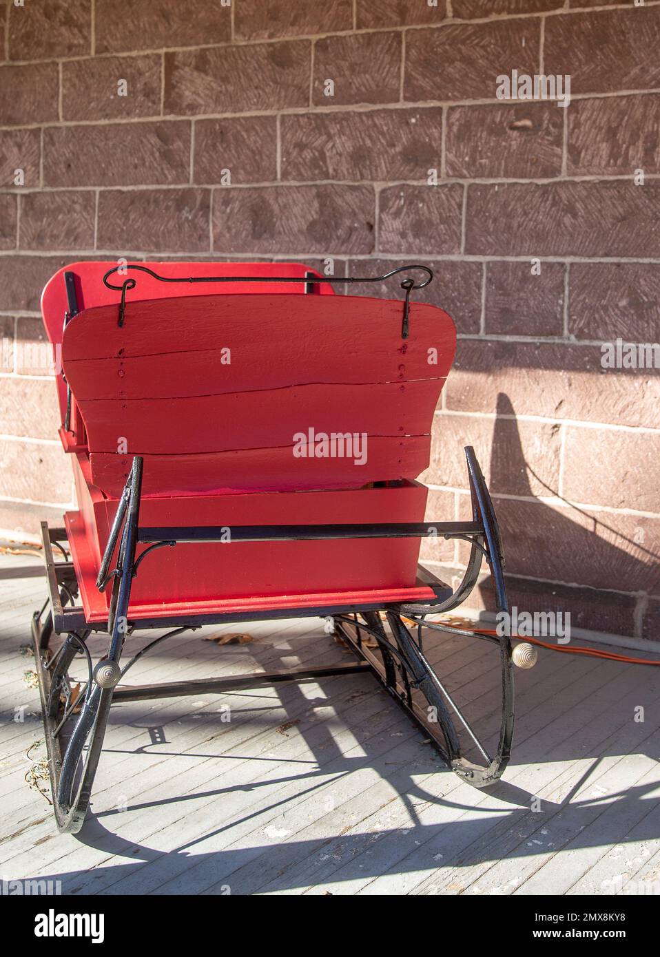 Antique red sled on display at a farm Stock Photo - Alamy