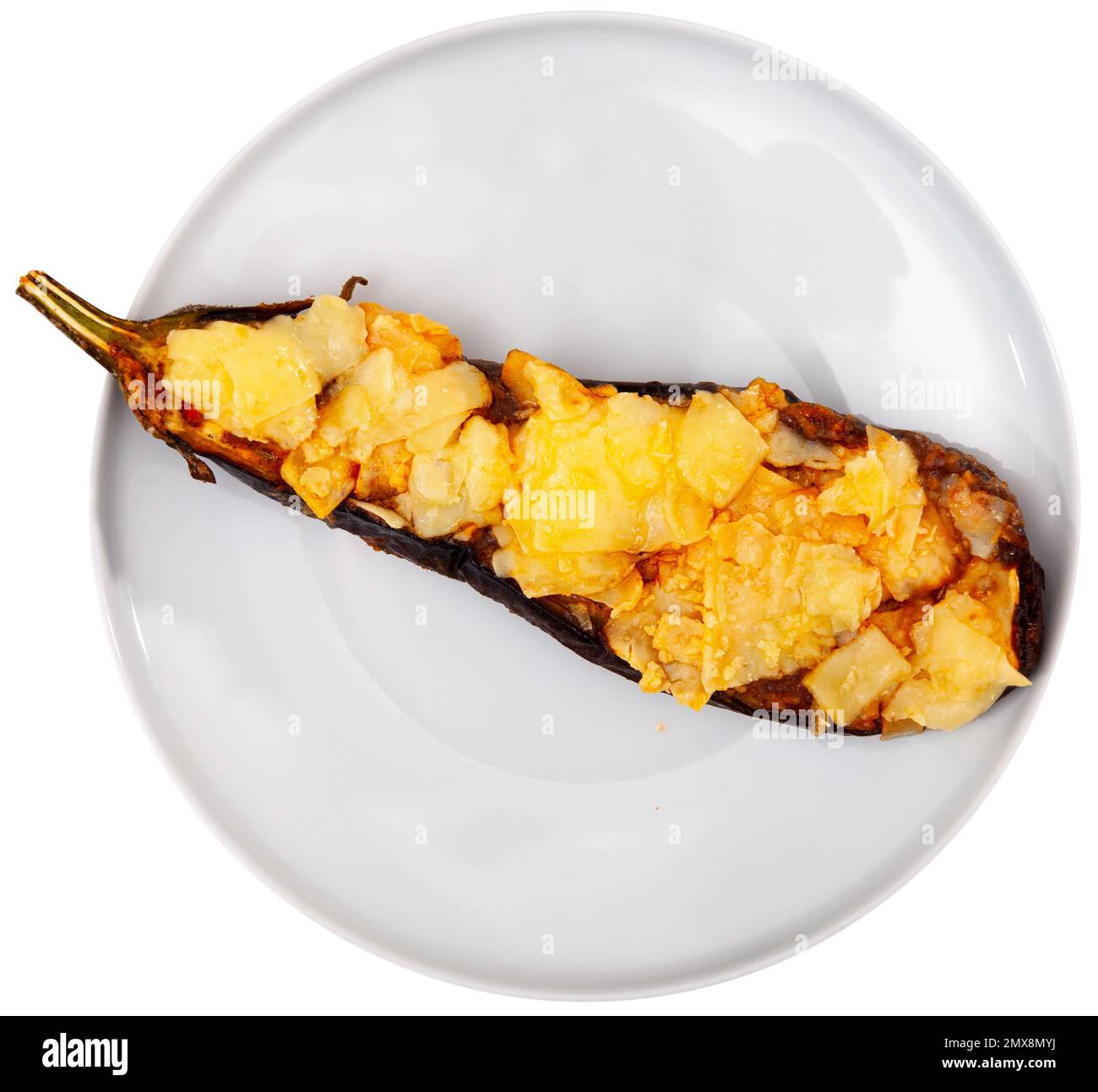Baked half of eggplant gratinated with cheese Stock Photo - Alamy