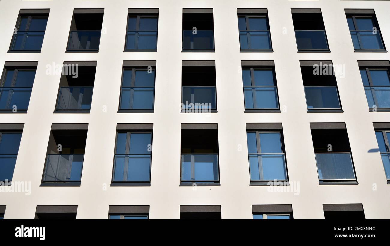 Exterior of a high modern multi-story apartment building - facade ...