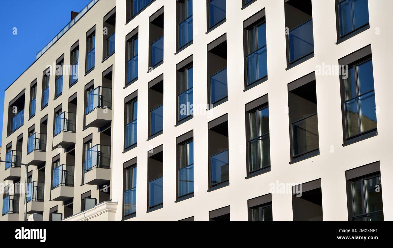 Exterior of a high modern multi-story apartment building - facade ...