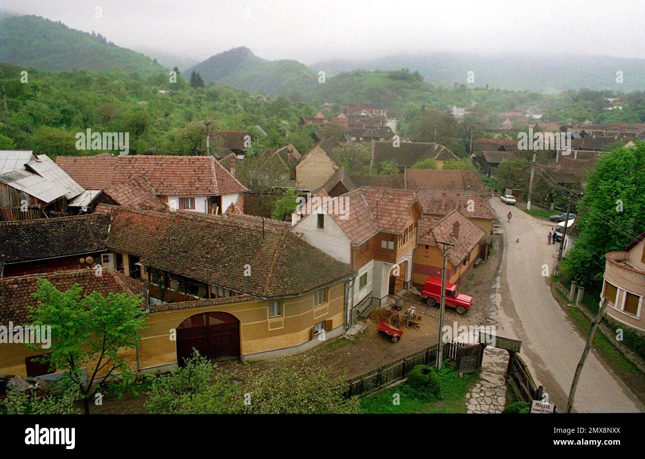 Sibiu County, Romania, approx. 1999. View over a village with typical ...