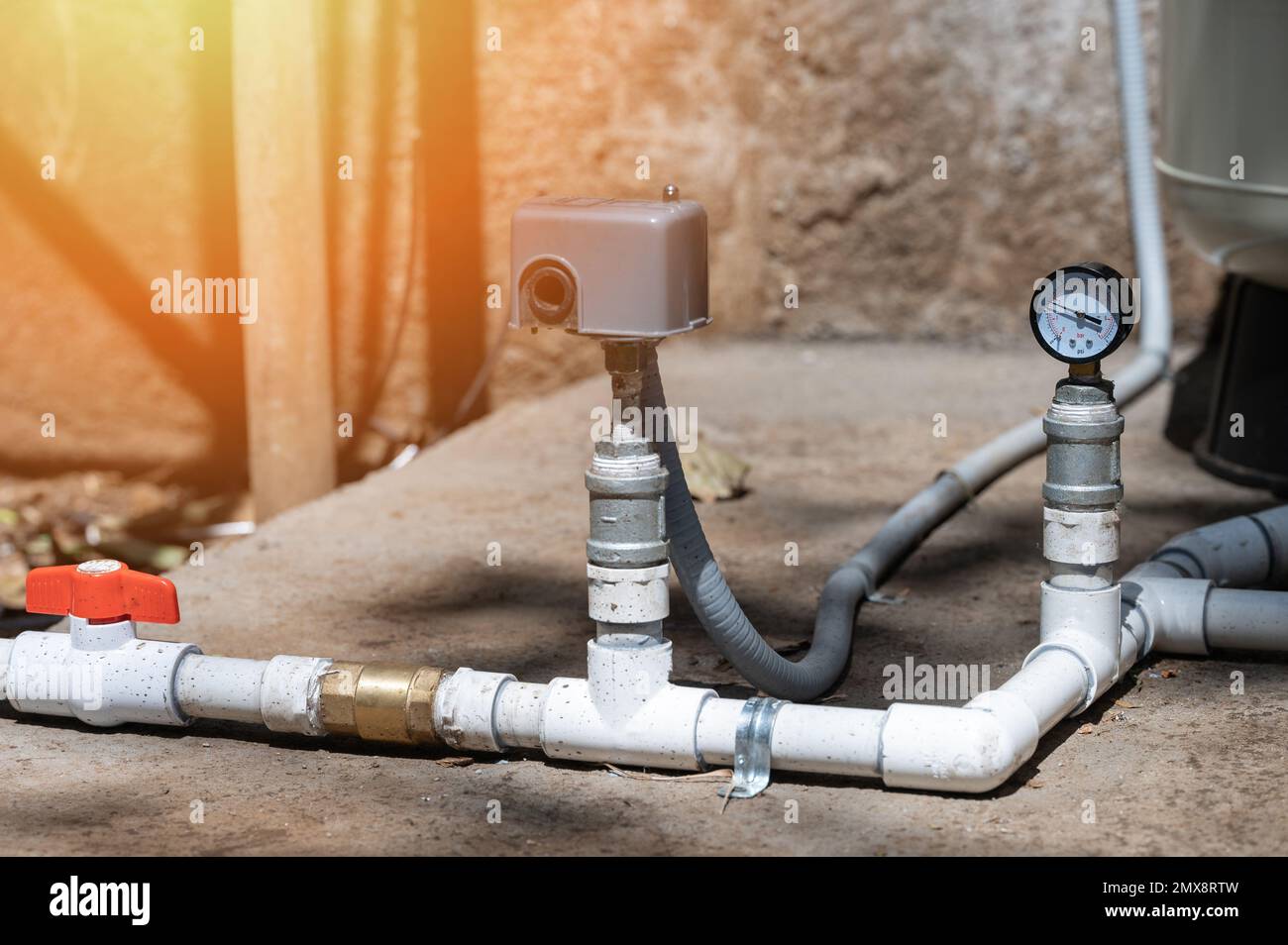 High pressure water pump pipe connection plumbing close up view Stock ...