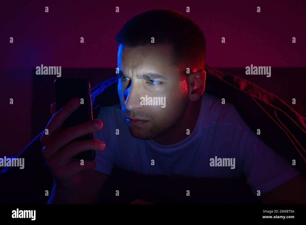 The guy got a security alert on his phone. Alarm button. Danger ...