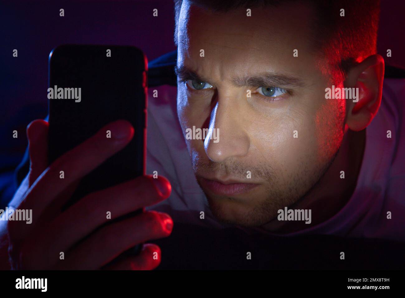 The guy got a security alert on his phone. Alarm button. Danger ...