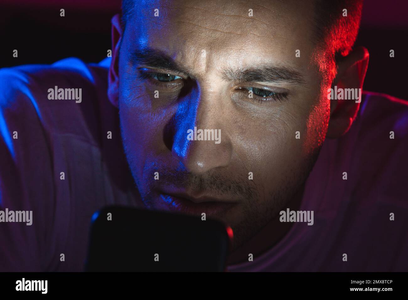 The guy got a security alert on his phone. Alarm button. Danger ...