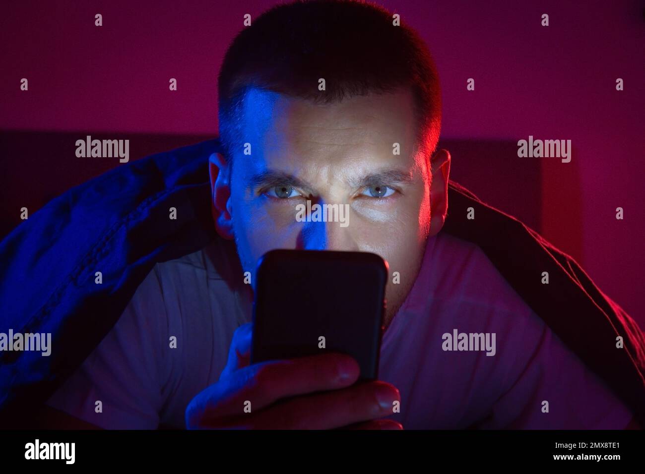 The guy got a security alert on his phone. Alarm button. Danger ...