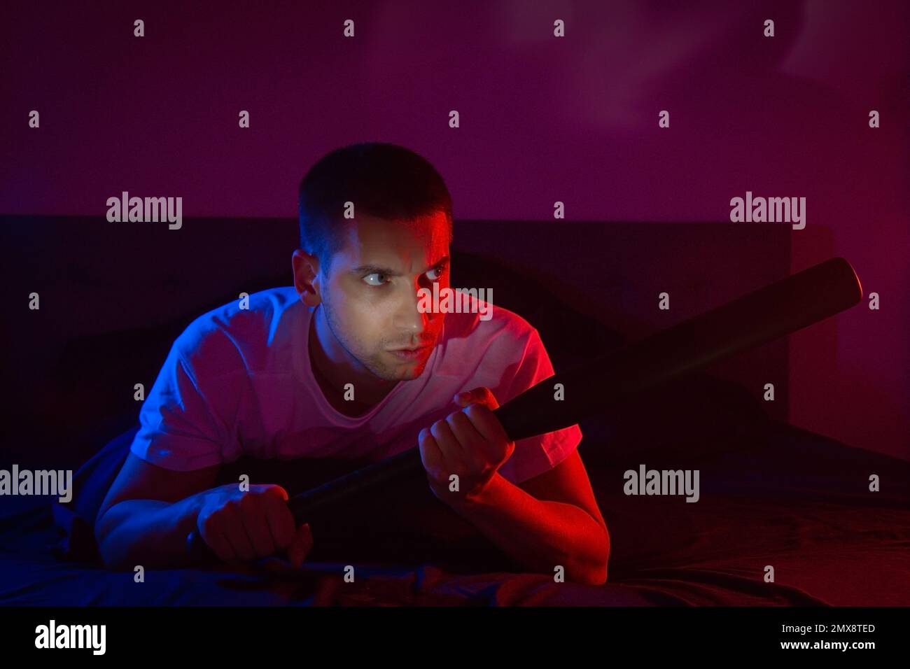 The guy got a security alert on his phone. Alarm button. Danger ...