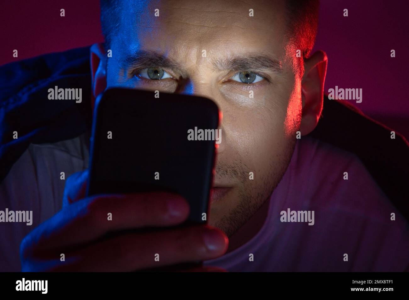 The guy got a security alert on his phone. Alarm button. Danger ...