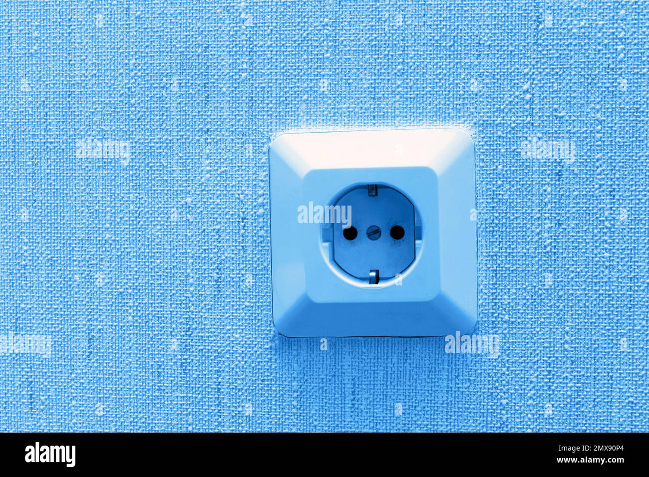 electric socket on wall, blue abstract background Stock Photo - Alamy