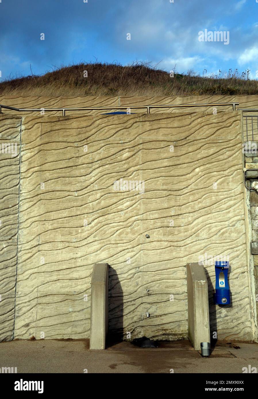 Water / fossett. Outdoors with decorated concrete surround. Barry ...