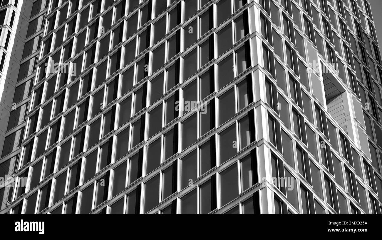Commercial building close up in blue tone. Gigantic skyscraper from ...