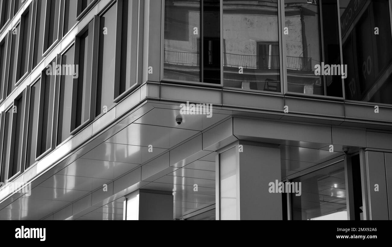 Commercial building close up in blue tone. Gigantic skyscraper from ...