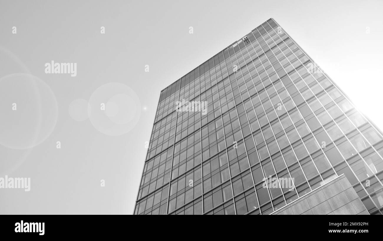 Commercial building close up in blue tone. Gigantic skyscraper from ...