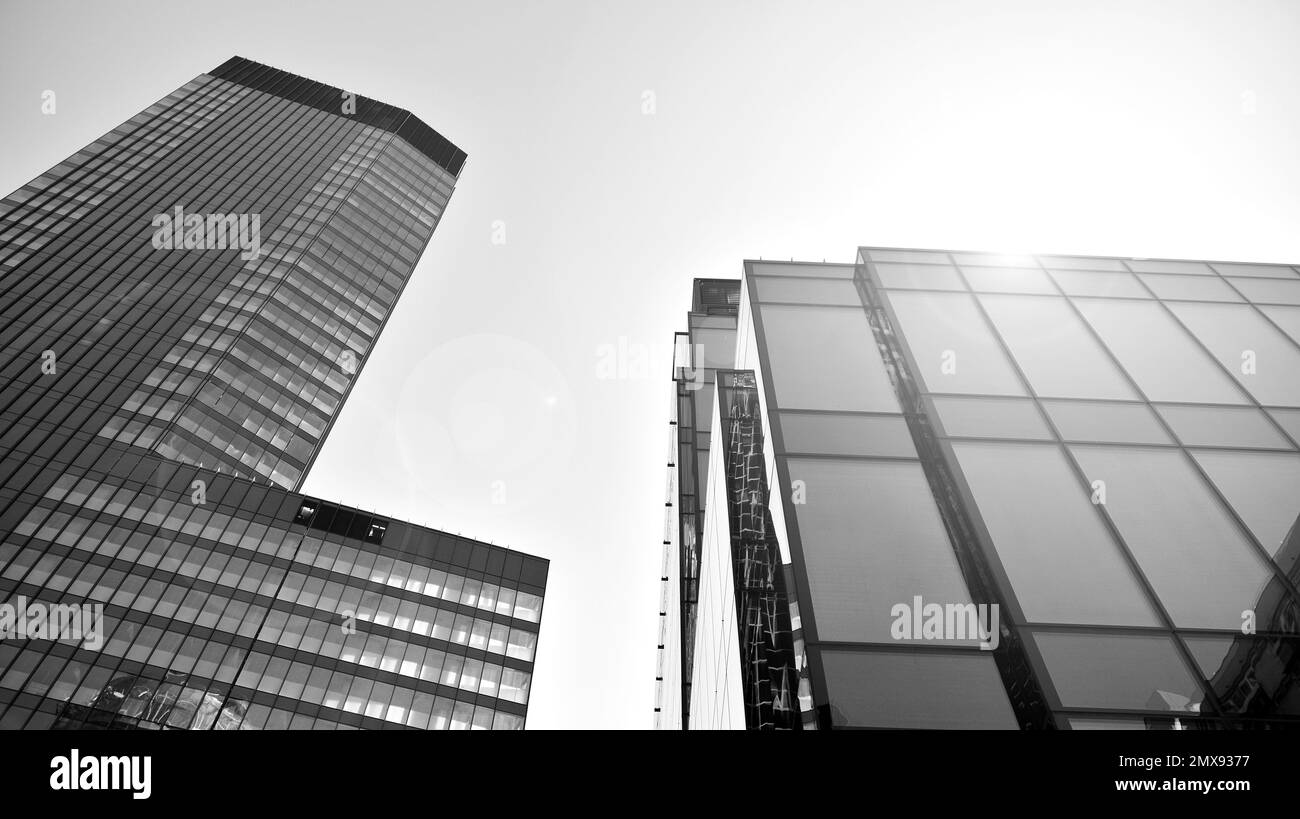 Commercial building close up in blue tone. Gigantic skyscraper from ...