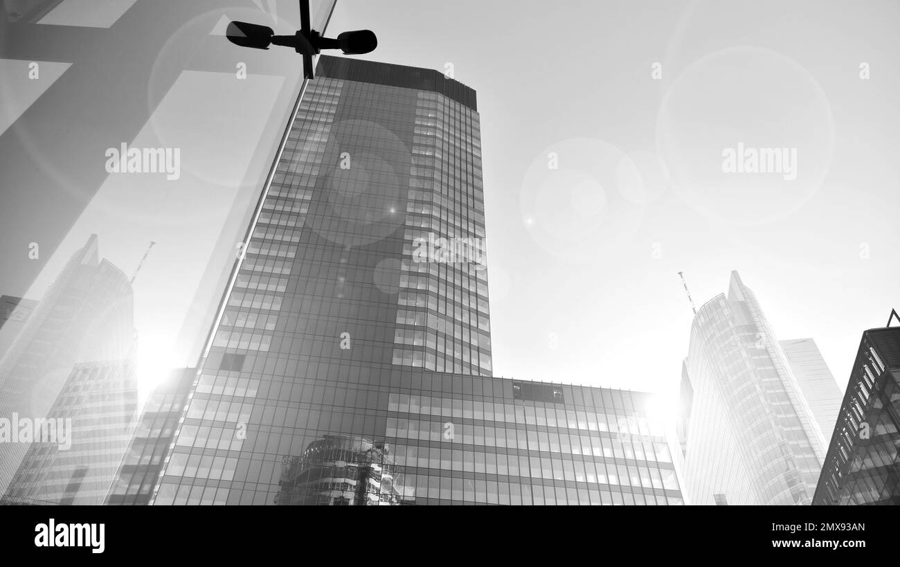 Commercial building close up in blue tone. Gigantic skyscraper from ...