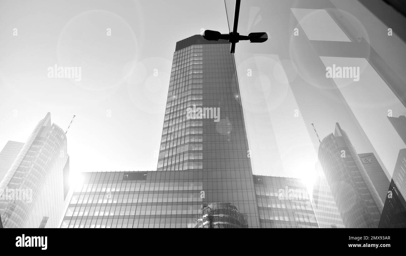 Commercial building close up in blue tone. Gigantic skyscraper from ...