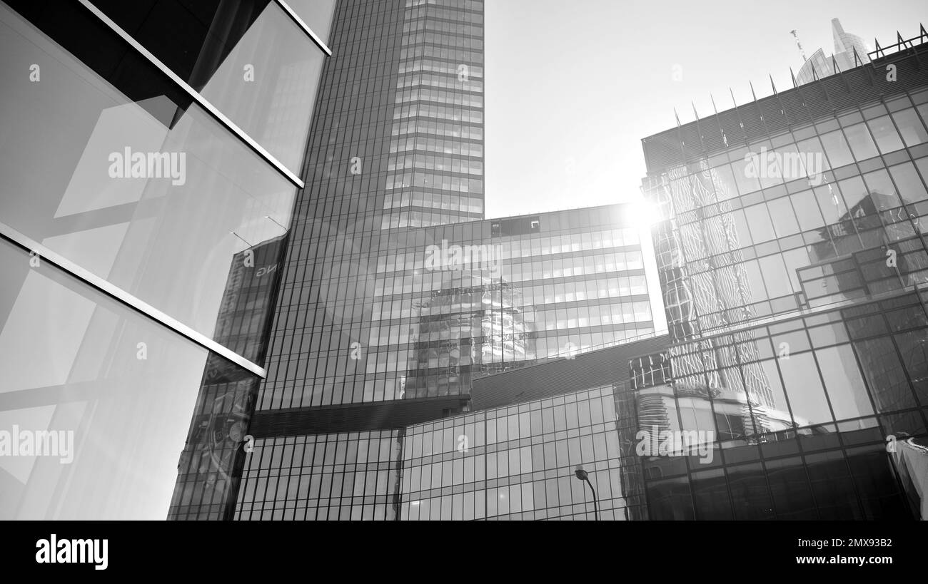 Commercial building close up in blue tone. Gigantic skyscraper from ...